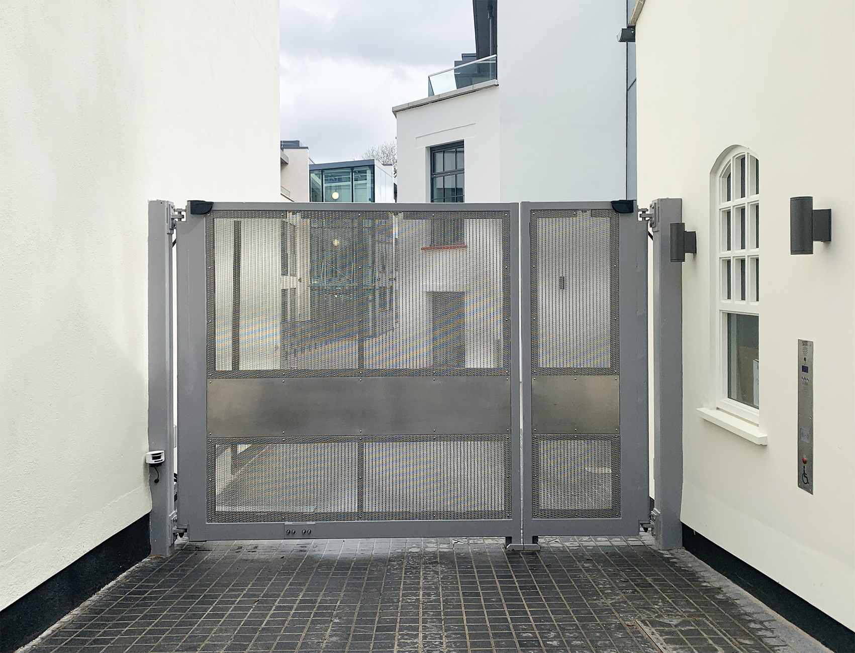 Mixed Use Development Hinged Vehicle & Pedestrian Gates - Frontier Pitts